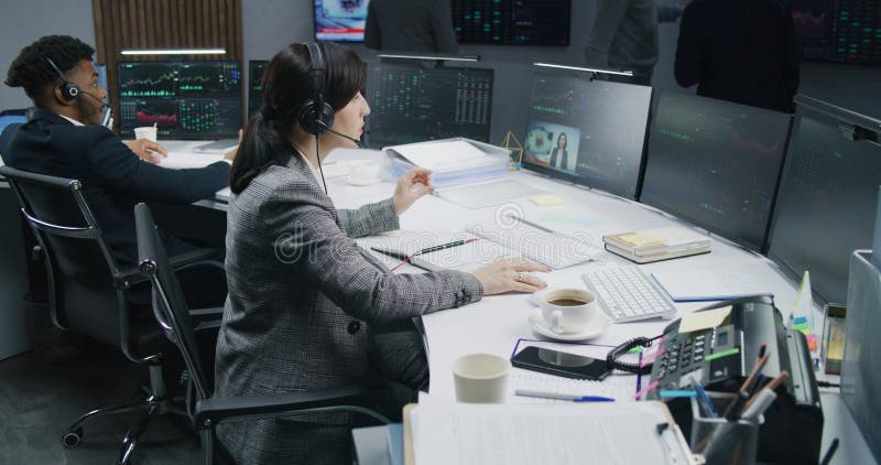 Female Trader Writes in Notepad and Work Stock Image - Image of analyze ...