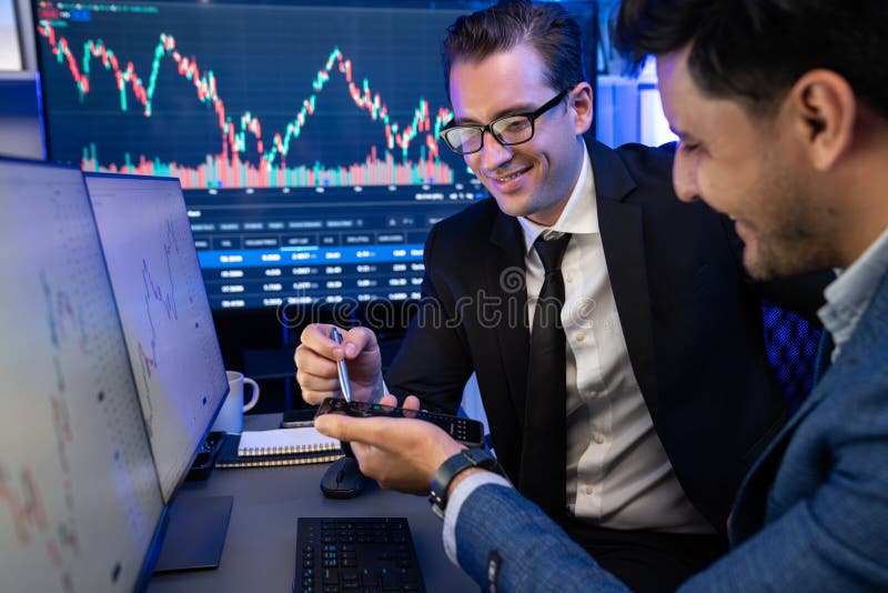 Traders Comparing Dynamic Investment Graph Via Phone and Pc. Sellable ...
