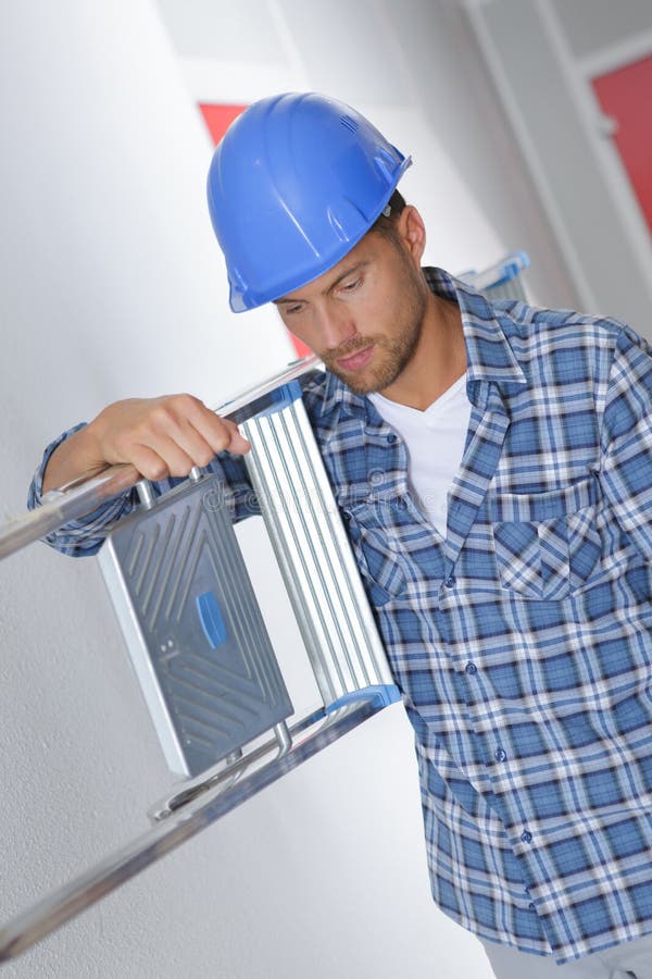 Tradesman Carrying a Stepladder Stock Photo - Image of work, workman ...