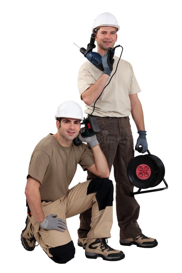 Tradesmen with a drill stock photo. Image of machinery - 229770