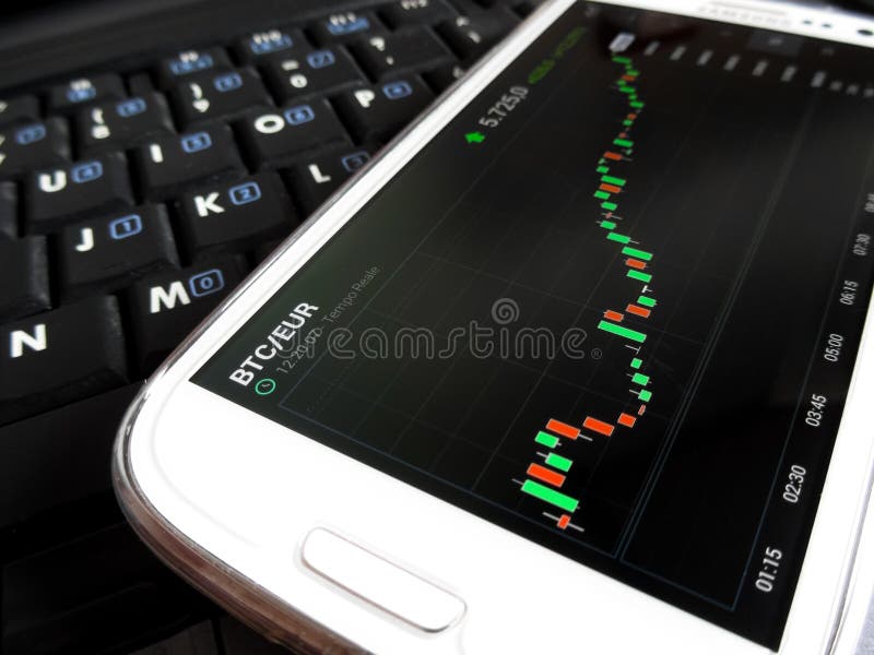 Trading Bitcoins Using a Smartphone Stock Photo - Image of profit ...