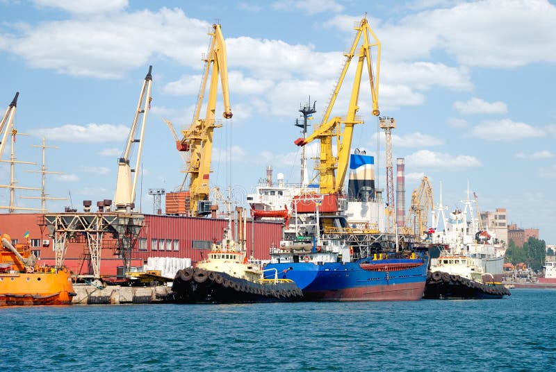 The Trading Seaport with Cranes, Cargoes and Ship Stock Image - Image ...