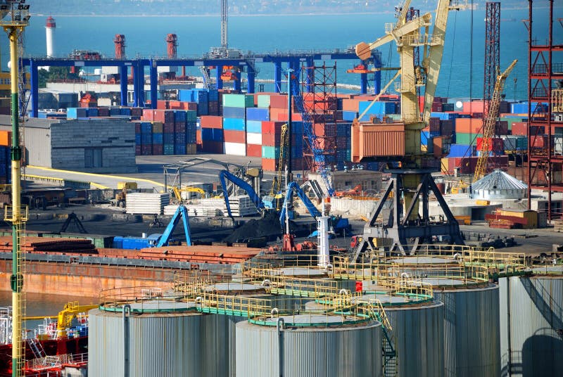 The Trading Seaport with Cranes, Cargoes and Ship Stock Photo - Image ...