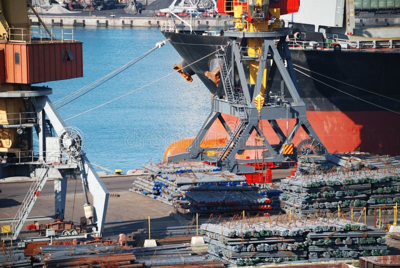 The Trading Seaport with Cranes, Cargoes and Ship Stock Photo - Image ...