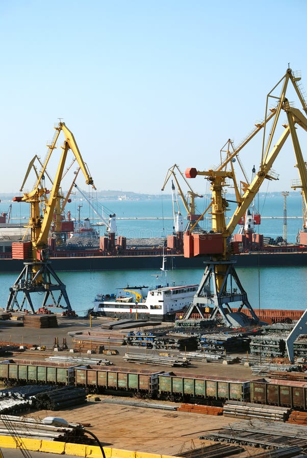 The Trading Seaport with Cranes, Cargoes and Ship Stock Photo - Image ...