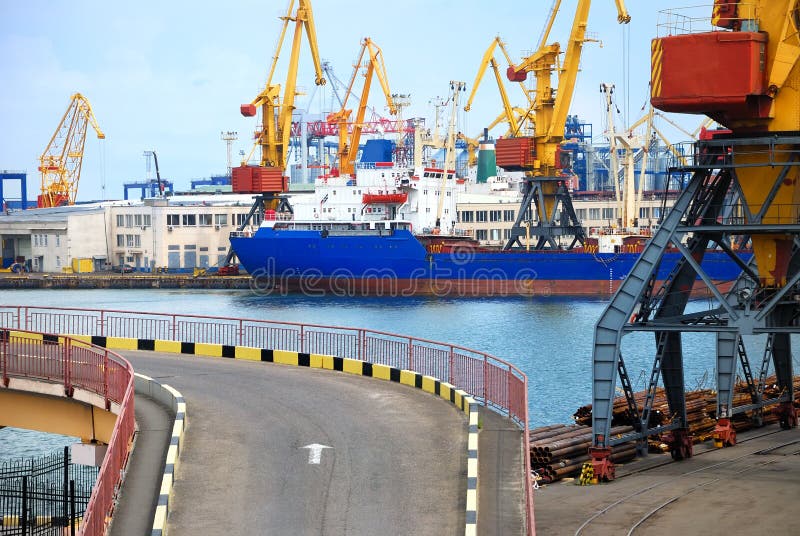 The Trading Seaport with Cranes, Cargoes and Ship Stock Photo - Image ...