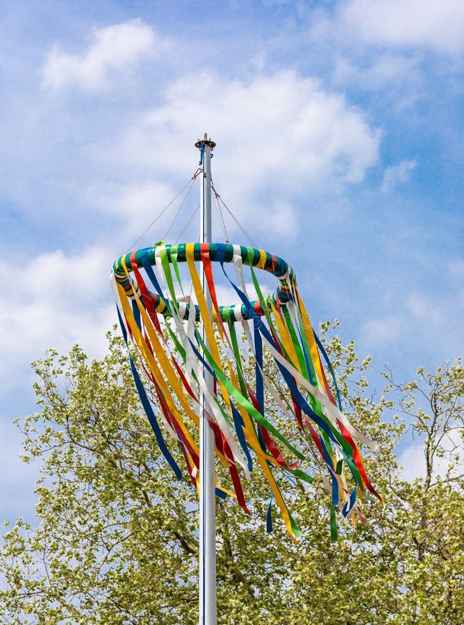 Tradiotional Maypole with Blue Sky Stock Image - Image of ribbon, white ...