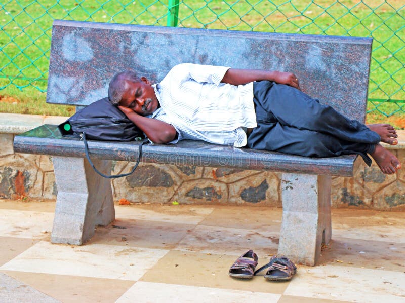 Traditional Afternoon Nap on Park Bench India Editorial Image - Image ...