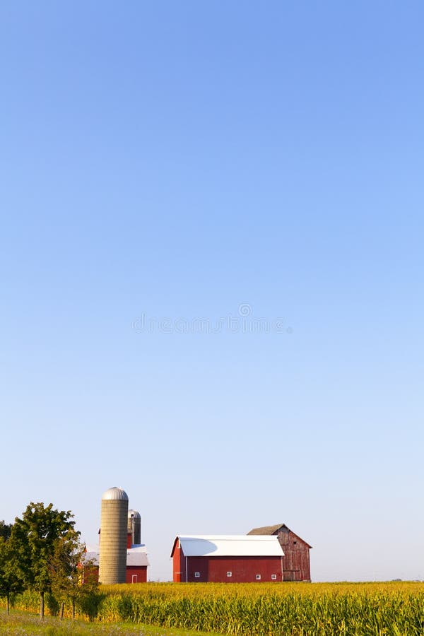 Traditional American Red Farm Stock Photo - Image of clouds, fence ...