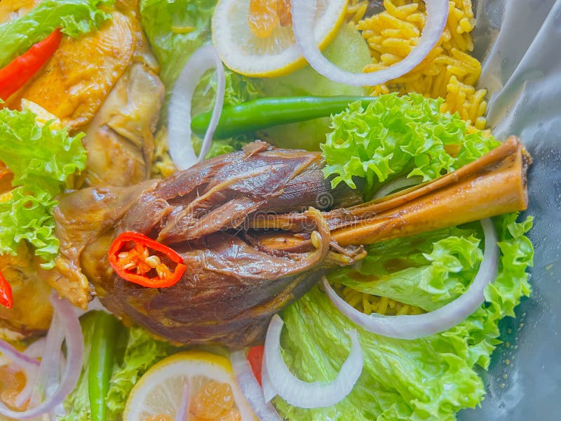 Traditional Arabic Rice with Lamb Shank in Big Plate. Stock Photo ...