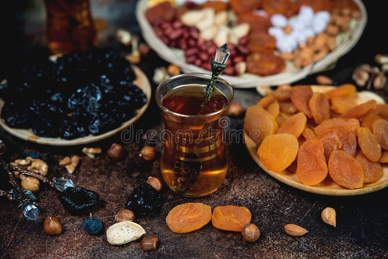 Traditional Arabic Tea with Dried Fruits , Nuts and Tea Stock Photo ...