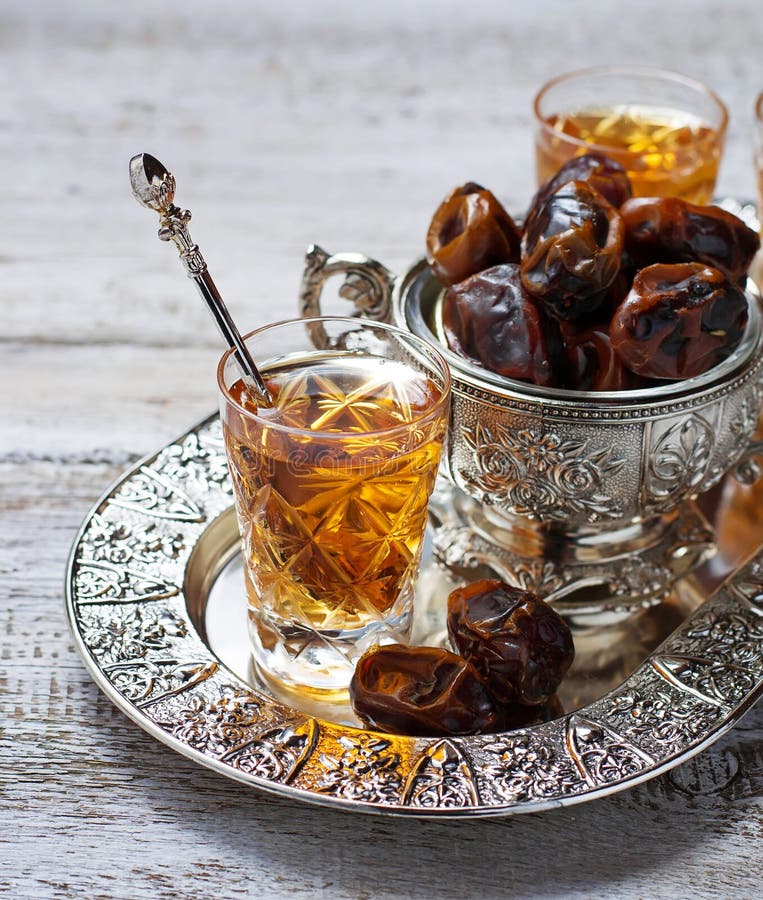 Traditional Arabic Tea and Dry Dates Stock Image - Image of bead ...