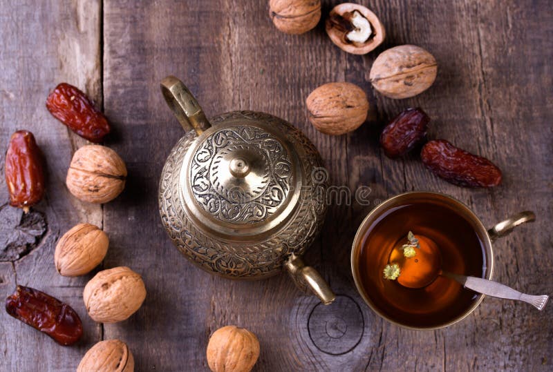 Traditional Arabic Tea Set and Dried Dates. Stock Photo - Image of ...