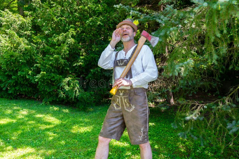 A Traditional Austrian Hunter or Woodcutter Against the Backdrop of a ...
