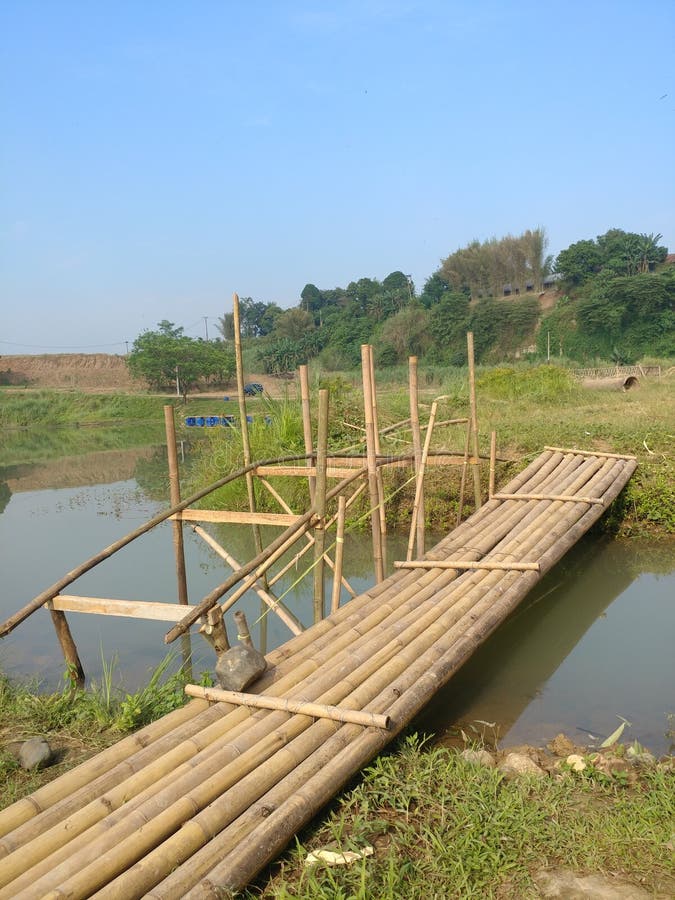 Traditional Bamboo Bridge Over a Small River Stock Image - Image of ...