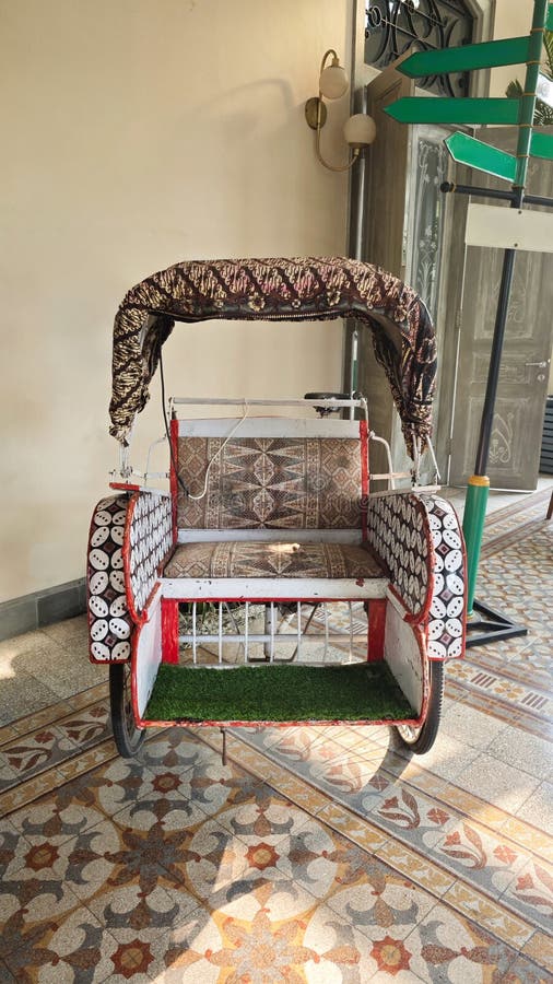 Traditional Becak Tricycle Adorned with Batik Patterns in an Indonesian ...