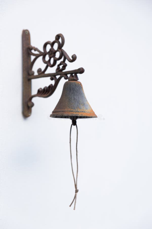 Traditional Bell on a Whitewashed Wall Stock Photo - Image of antique ...
