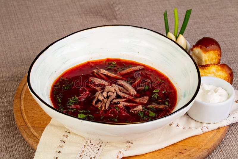 Red Borsch With Meat In Plate. A Delicious Red Borscht With Sour Cream ...