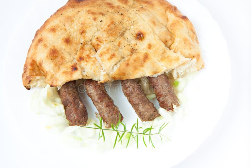 Traditional Bosnian Food Cevapi with Flat Bread and Onion Stock Photo ...