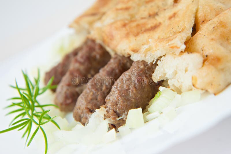 Traditional Bosnian Food Cevapi with Flat Bread and Onion Stock Photo ...