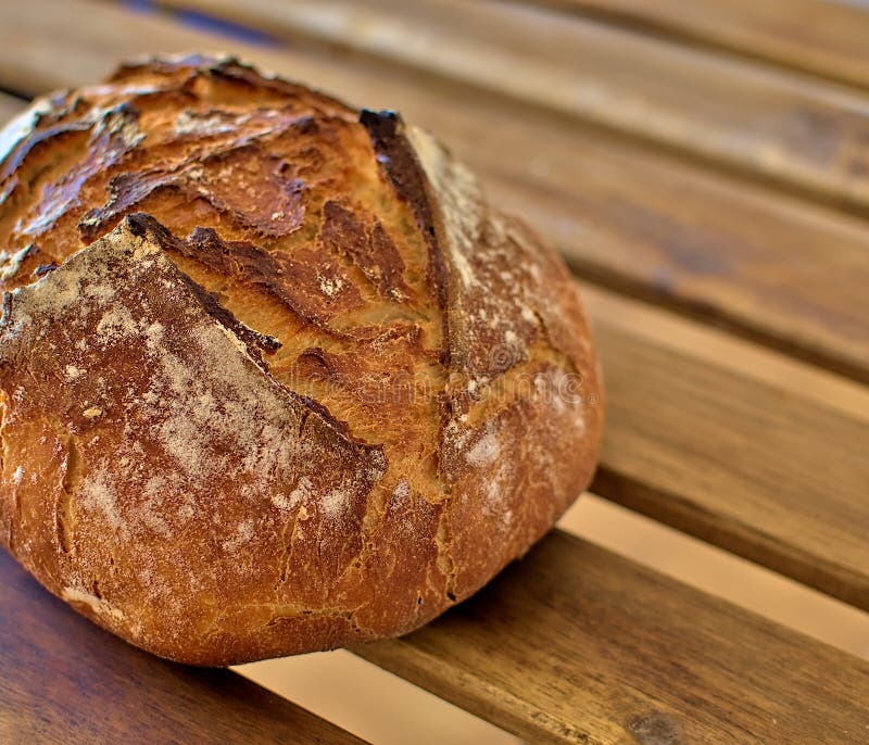 Traditional Bread Loaf on a Wooden Table Stock Image - Image of ...