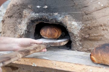 Traditional Bread Made in Medieval Oven. Stock Photo - Image of ...
