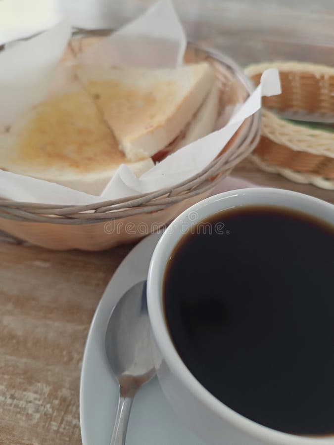 Traditional Breakfast with Egg and Ham Sandwich and Coffee Stock Photo ...