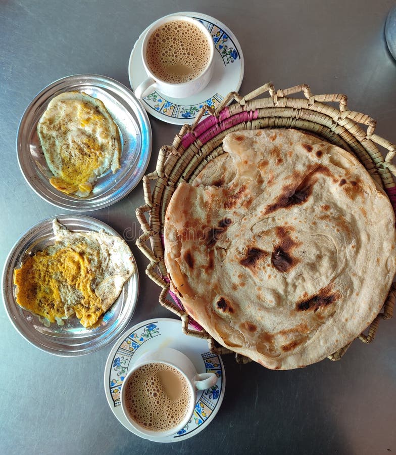 Traditional Breakfast in Pakistan Stock Photo - Image of paratha, milk ...
