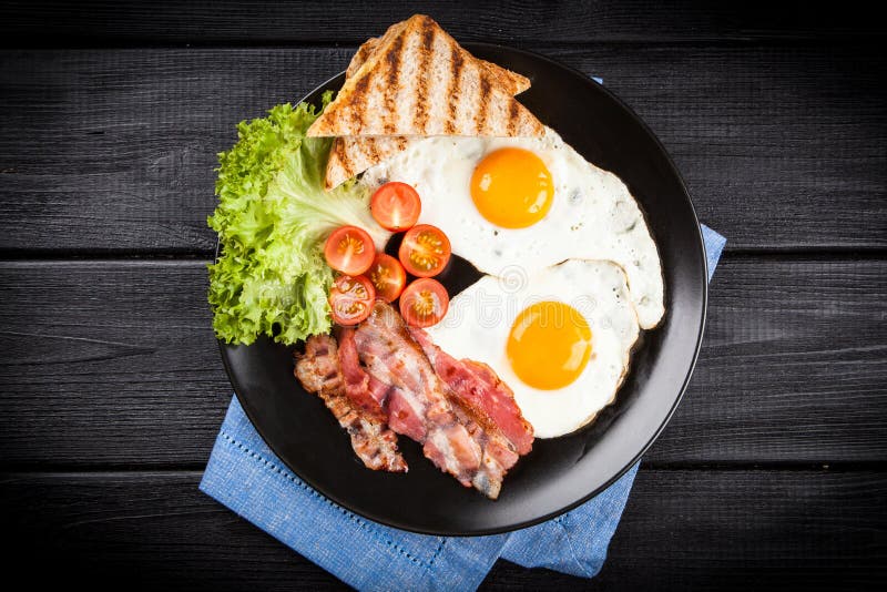 Traditional Breakfast on a Plate Stock Photo - Image of strips ...