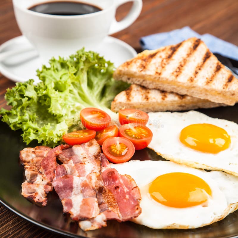 Traditional Breakfast on a Plate Stock Image - Image of fresh, green ...