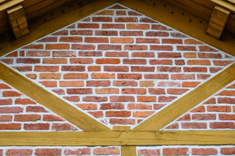 Traditional Brick Wall with Wood Inserts, As a Graphic Background Stock ...