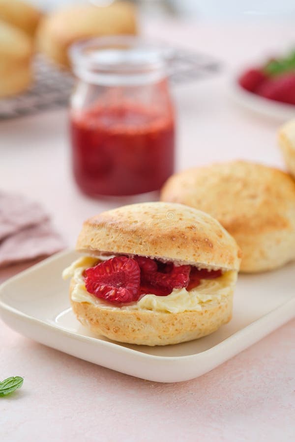 Traditional British Scones with Clotted Cream, Raspberry Jam. Scones ...