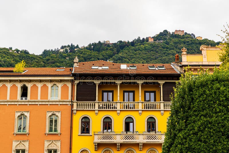 Traditional Building with Pattern Windows and Trees Under Green ...