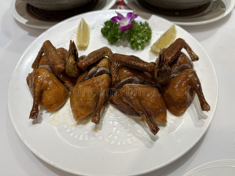 Traditional Cantonese Roasted or Grilled Crispy Pigeon Stock Image ...