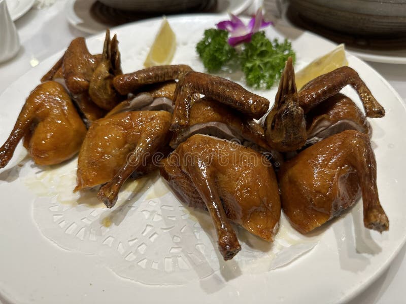 Traditional Cantonese Roasted or Grilled Crispy Pigeon Stock Photo ...