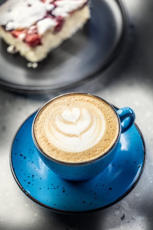 Traditional Cappucino Coffee with Cake on Cafe Table Stock Image ...
