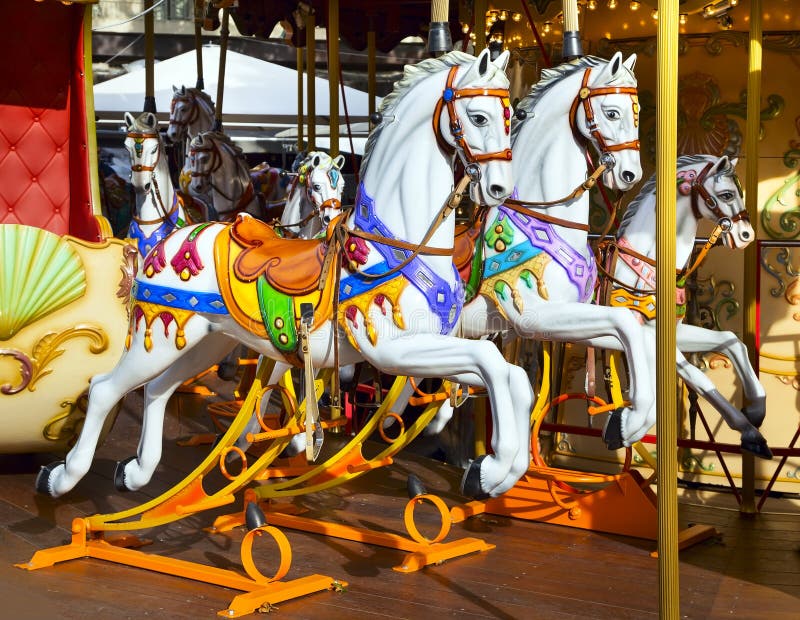 Traditional Carousel with Wooden Horses in an Italian Town Stock Photo ...