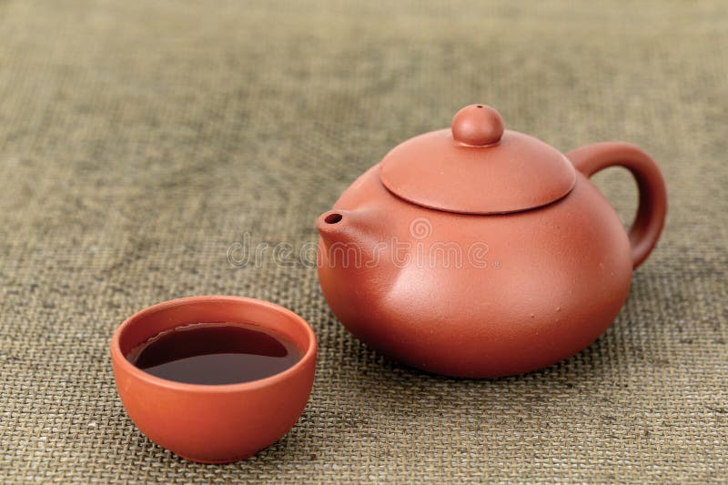 Traditional Chinese Clay Teapot and Cups with Tea on a Table Stock ...