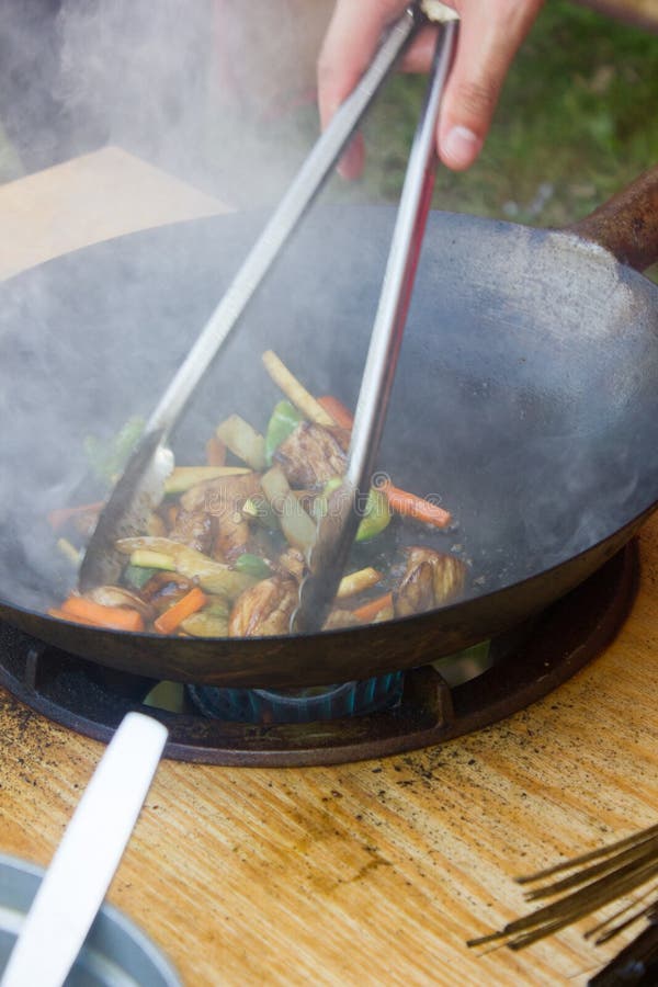 Traditional Chinese Food - Wok Cooking on Open Fire. Stock Image ...