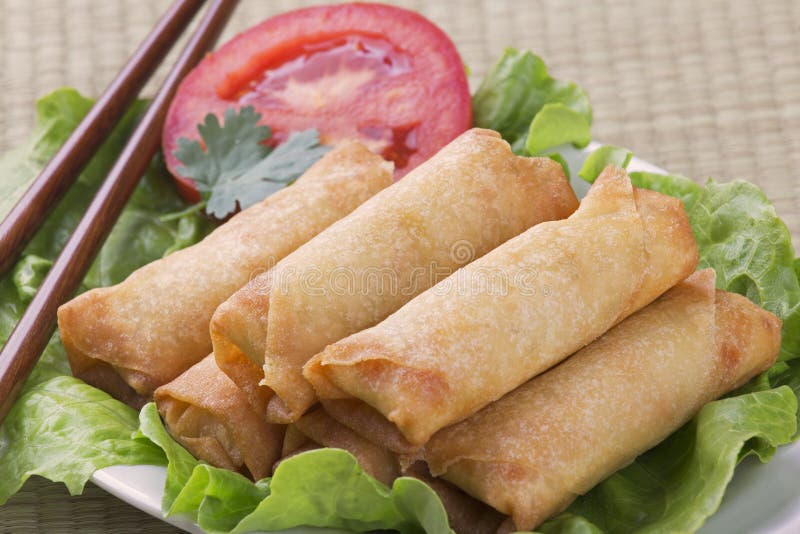 Traditional Chinese Spring Rolls on a Bed of Lettuce Stock Photo ...