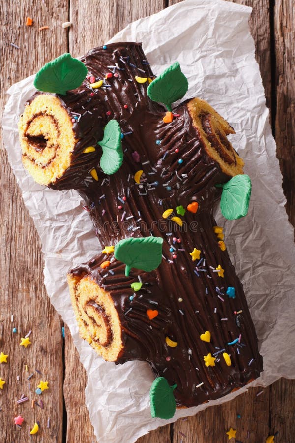 Traditional Chocolate Christmas Log Roll Close-up. Vertical Top Stock ...