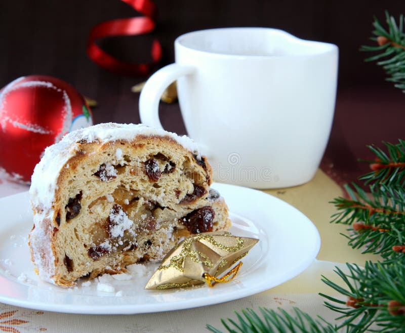 Christmas Pastries Stollen Sprinkled with Powdered Sugar on the Table ...