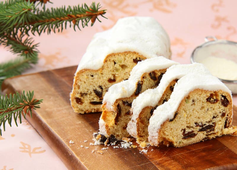 Christmas Pastries Stollen Sprinkled with Powdered Sugar on the Table ...