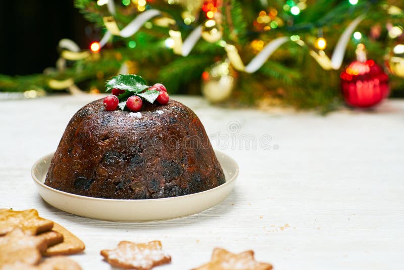 Traditional Christmas Pudding on Fir Tree Background Stock Image ...