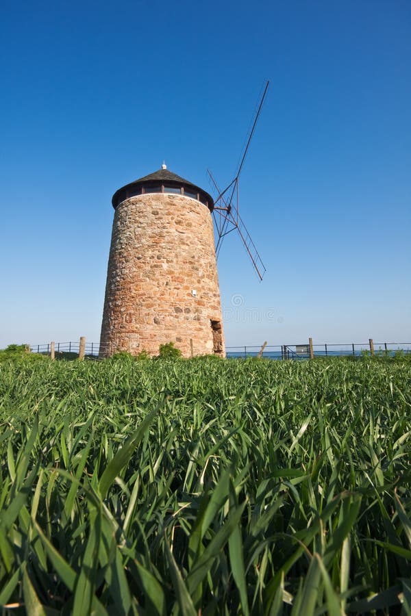 Traditional Coastal Windmill in Scotland Stock Photo - Image of flora ...
