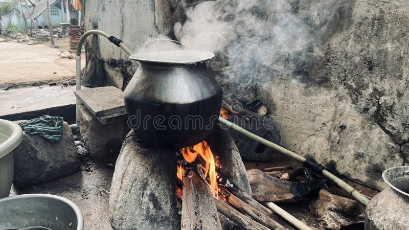 Traditional Cooking Method at a Village Using the Firewood Sticks and ...