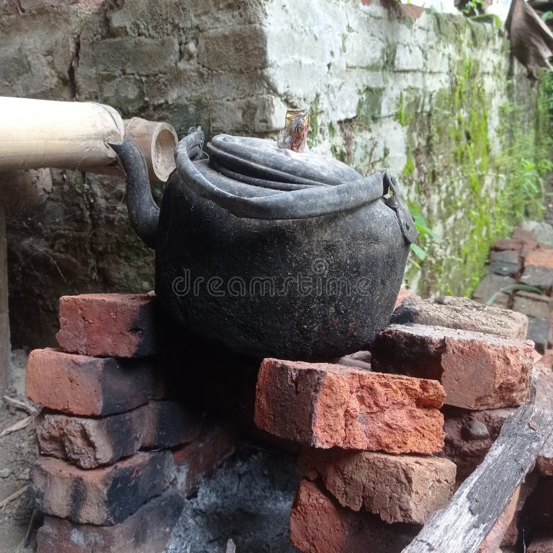 A Traditional Cooking Utensil for Boiling Water Stock Photo - Image of ...
