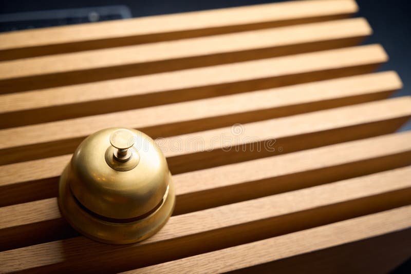 Traditional Copper Bell for Calling Staff at the Reception Desk Stock ...