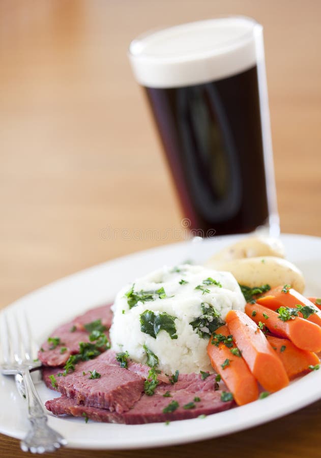 Traditional Corned Beef Dinner with Beer Stock Photo - Image of green ...