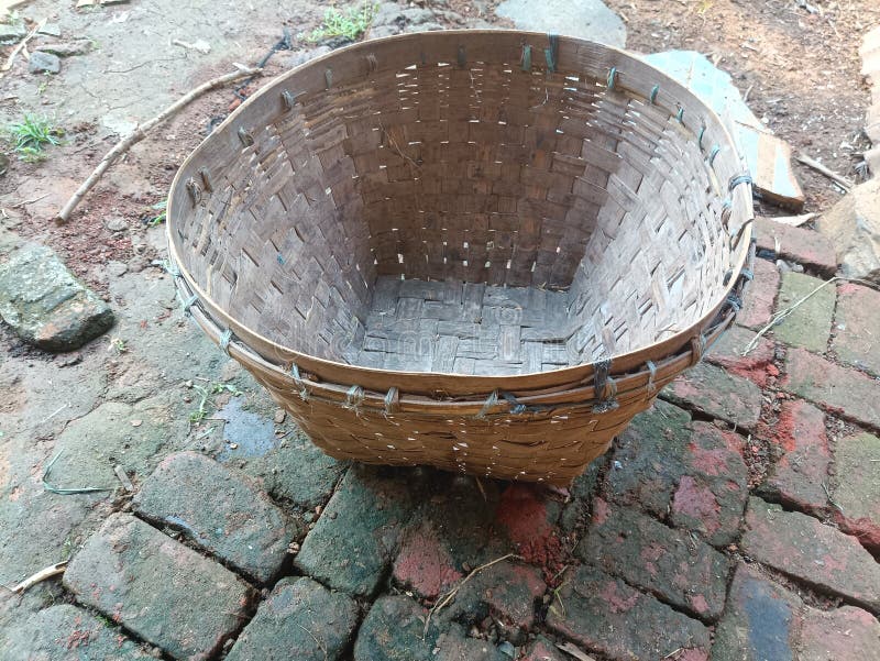 Traditional Craft of Woven Bamboo Rice Baskets on Bricks Stock Photo ...